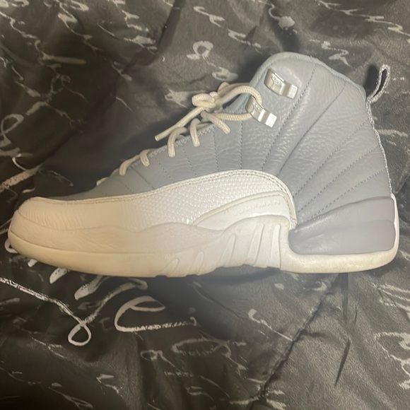 These are Jordan 12 retro’s “cool grey” size 5y in BIG KIDS. I’ll clean ...